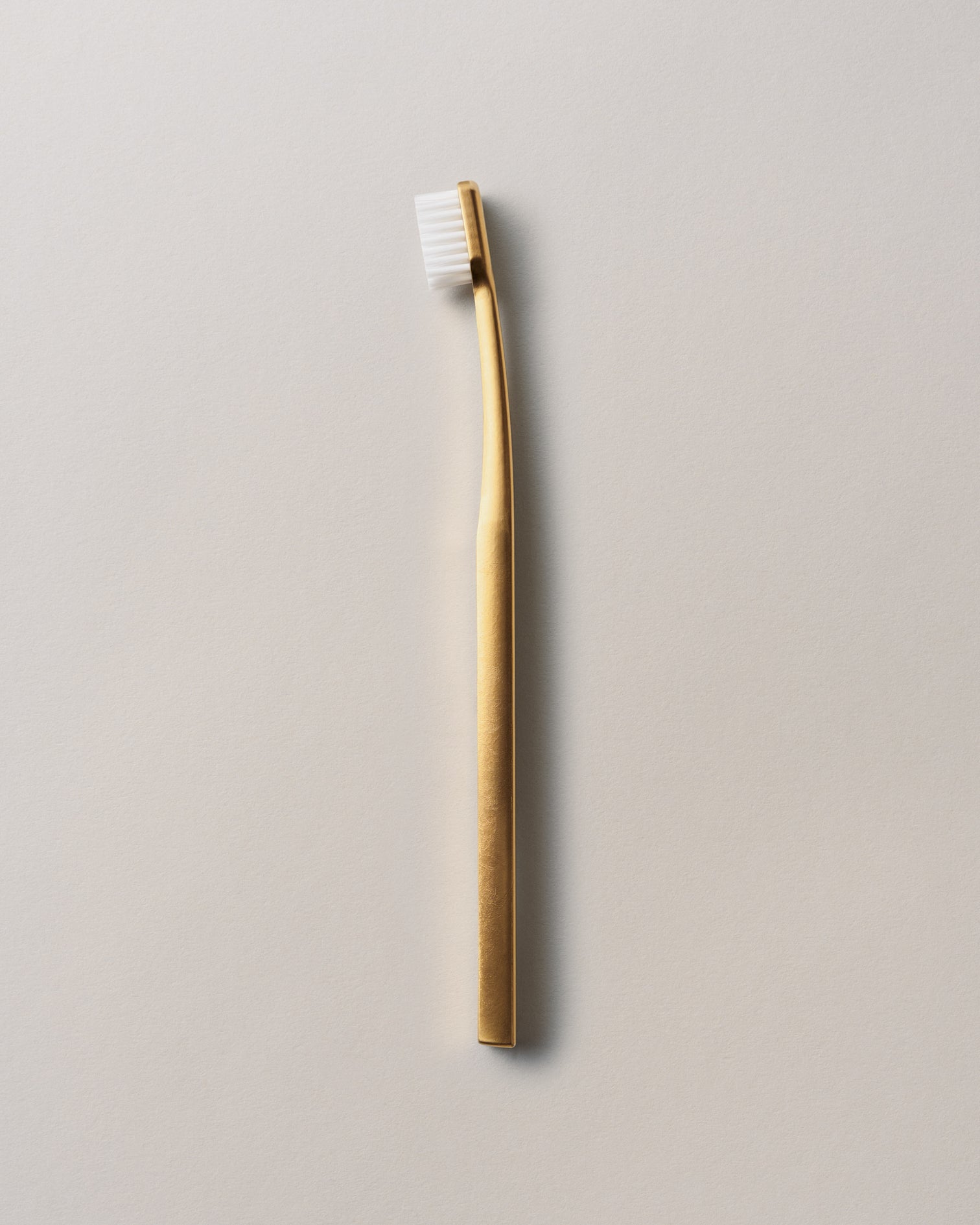 TOOTHBRUSH GOLD/WHITE – AUREZZI